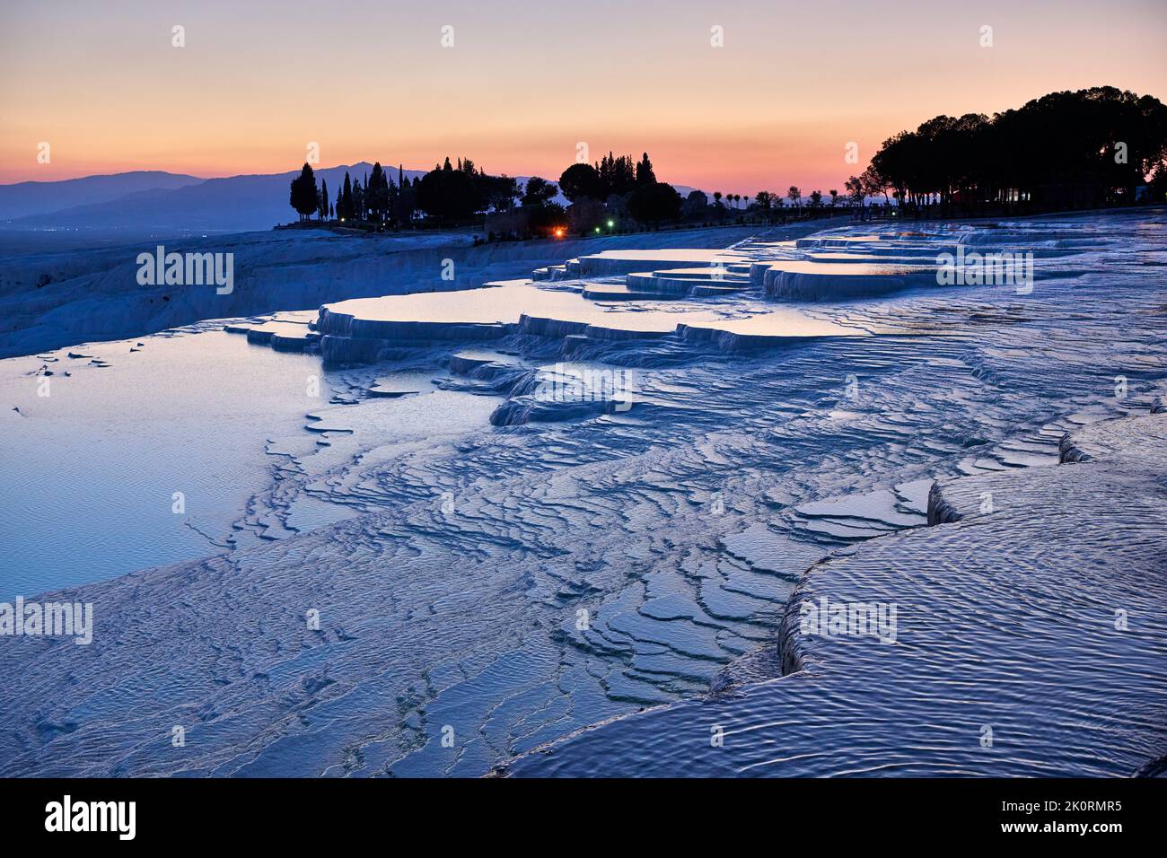 sunset behind Pamukkale travertine terraces, Denizli, Turkey Stock ...