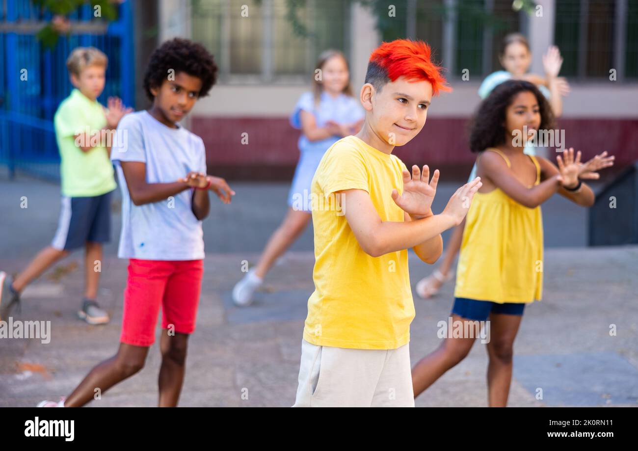 Children exercising contemporary dance moves outdoors Stock Photo - Alamy