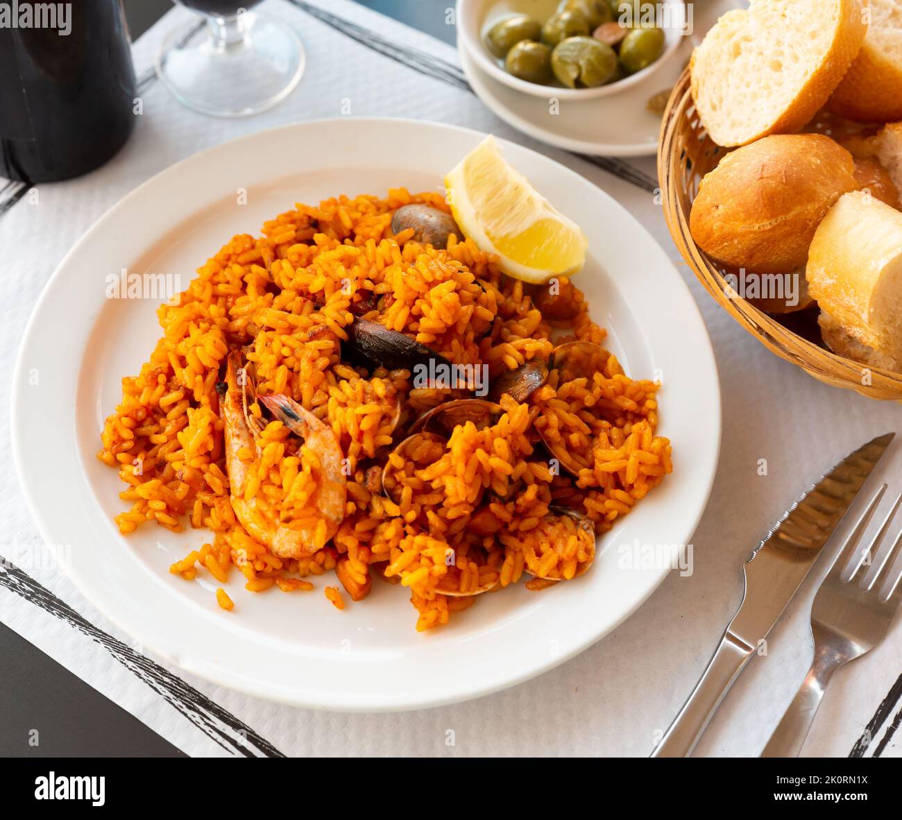 Spainsh dish seafood paella with rice, shrimps and mussels Stock Photo ...