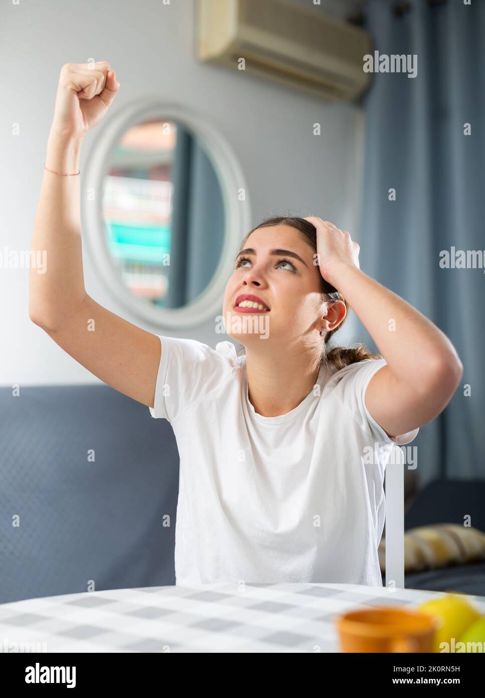 Stressed young woman suffering from noisy neighbors Stock Photo - Alamy