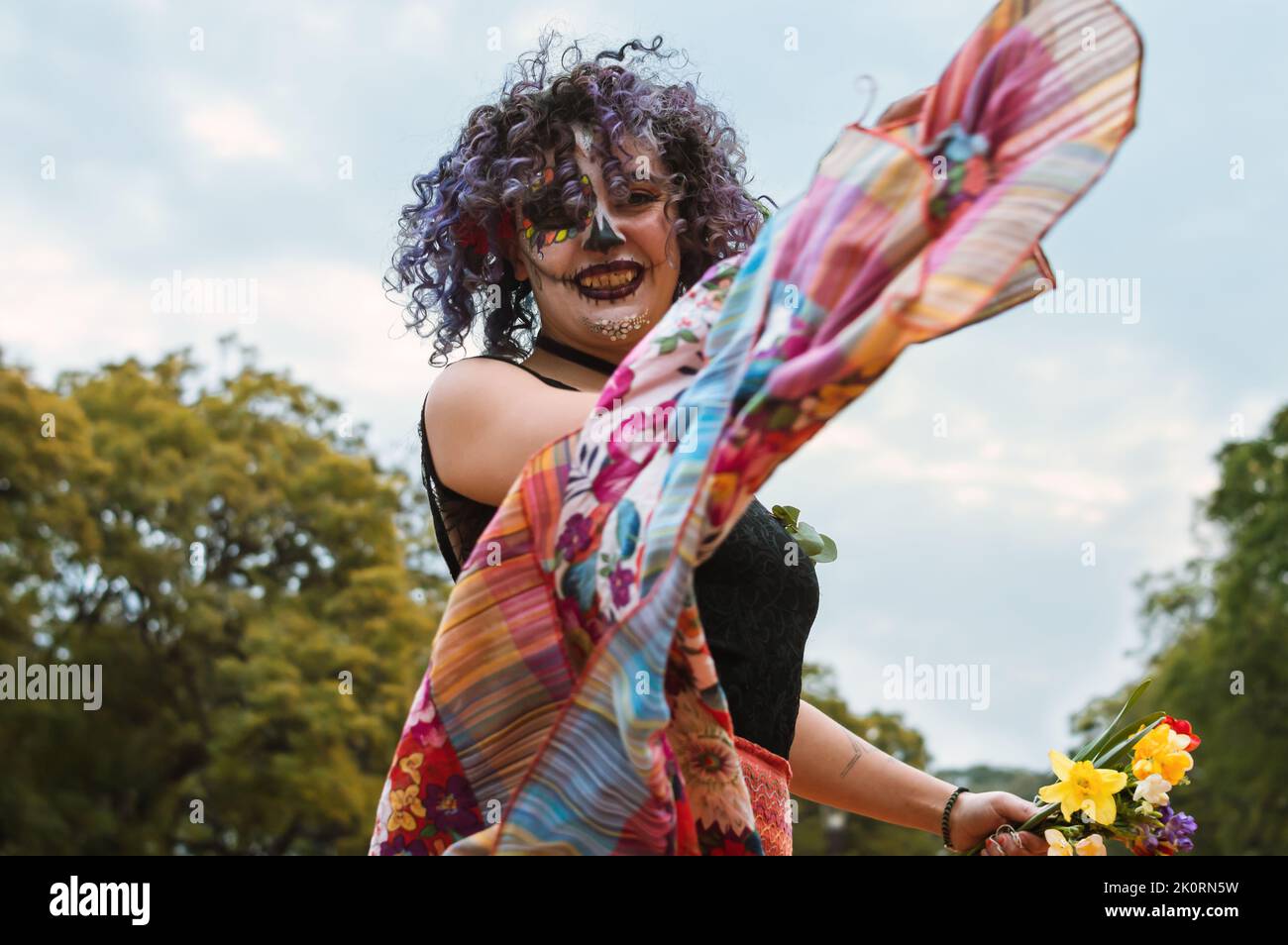 young latin caucasian argentinian woman, happy smiling with La Calavera ...