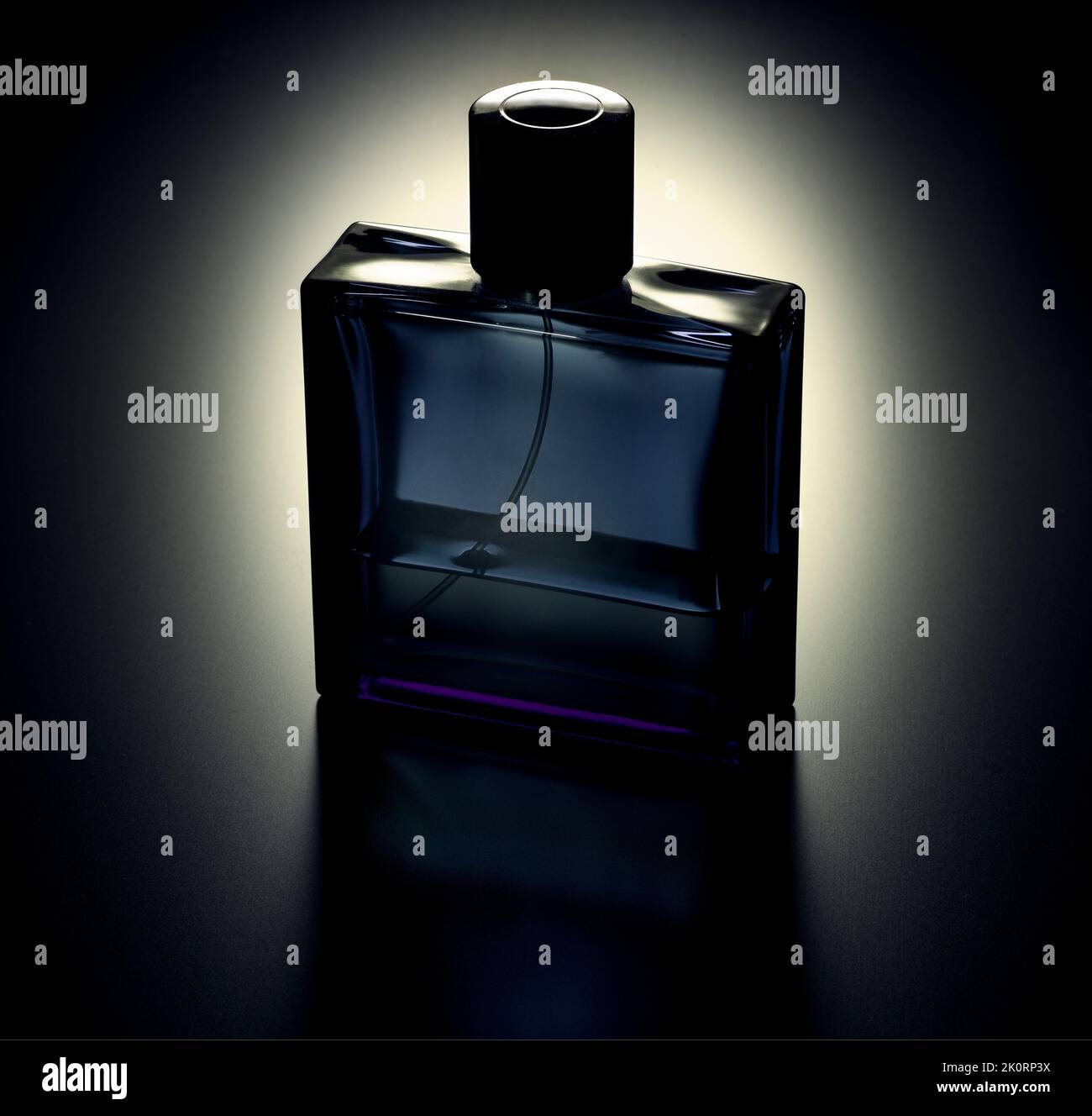 Backlight image of aftershave bottle. No logo. Black background. Clean ...