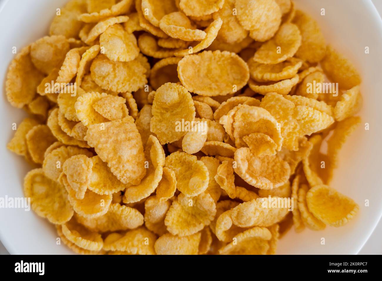 close up view of bowl with crispy yellow corn flakes,stock image Stock ...