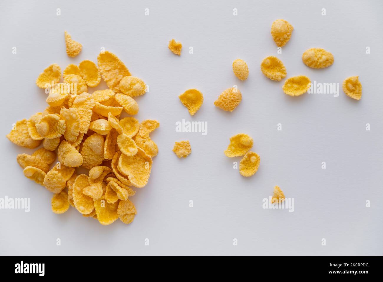 top view of dry and crispy corn flakes isolated on white,stock image ...