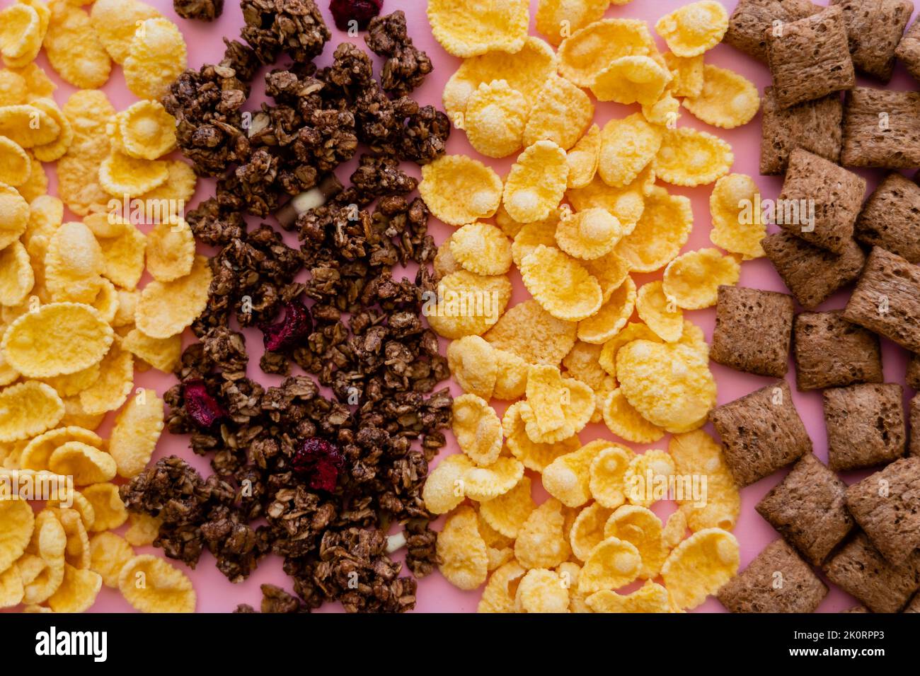 top view of various breakfast cereal corn flakes with puffs and granola ...