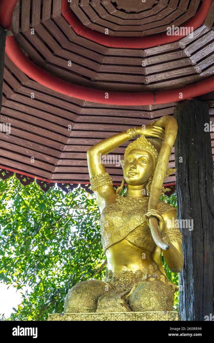 A beautiful golden statue of Buddha in Phra Phutta Ming Mongkol Akenakiri Thailand Stock Photo ...