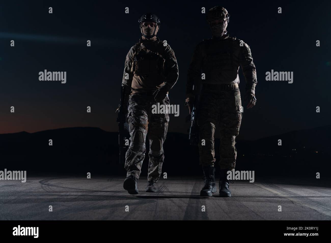 soldiers squad in night mission Stock Photo - Alamy