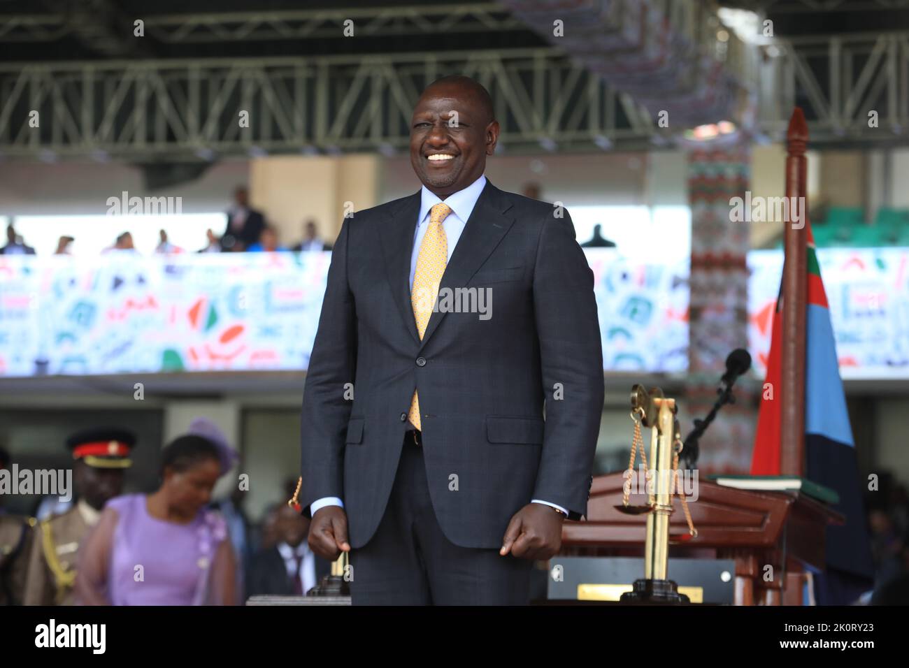 President William Ruto poses for a photo during the swearing in ceremony at the Kasarani Stadium ...