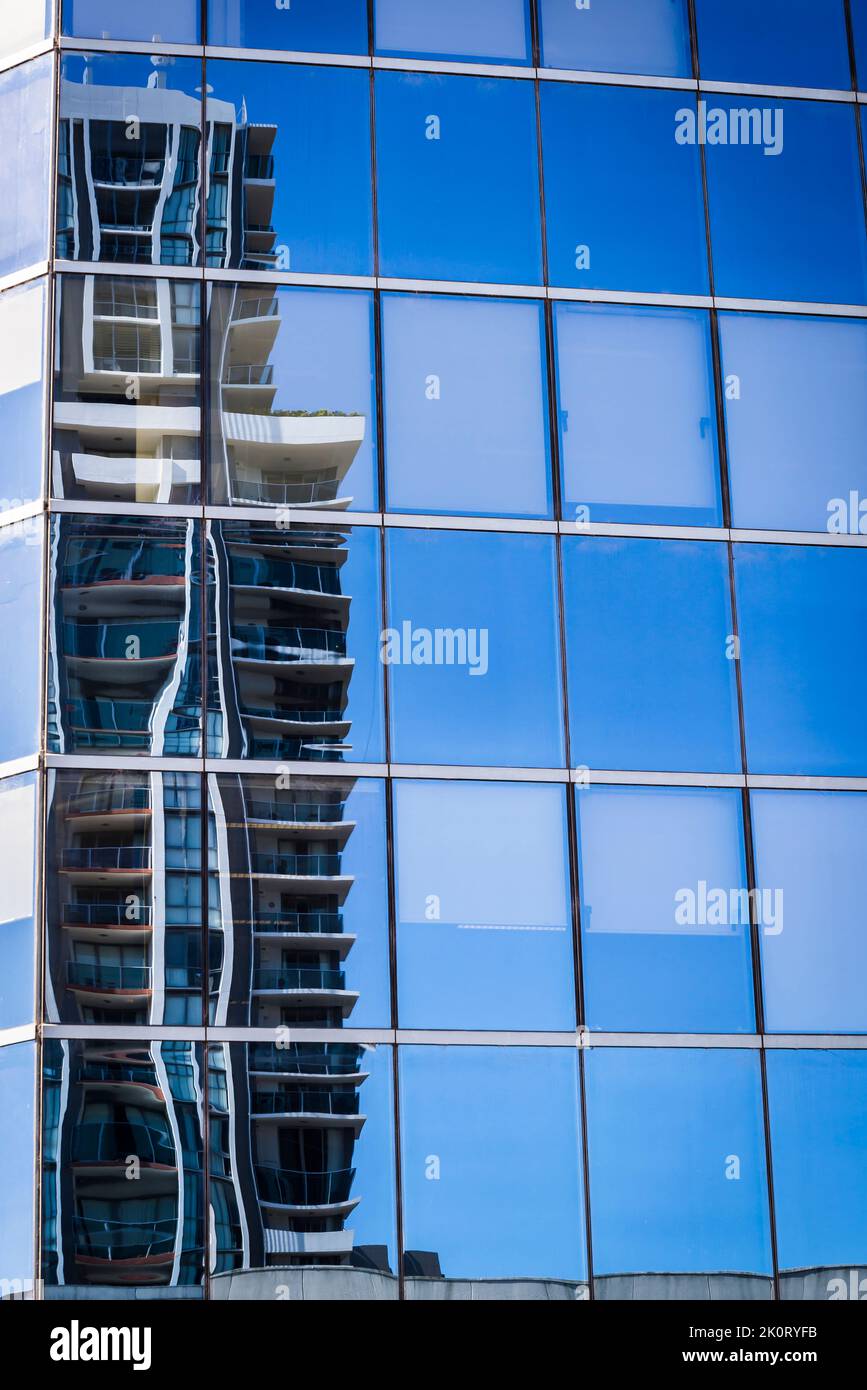 Reflections in glass building on Macquarie Street in the western suburb ...
