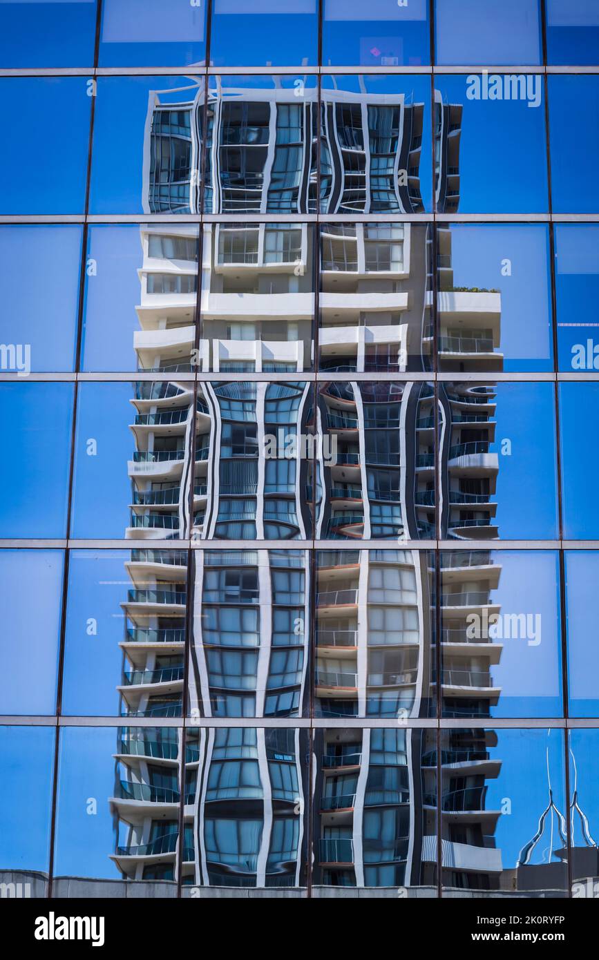 Reflections in glass building on Macquarie Street in the western suburb ...