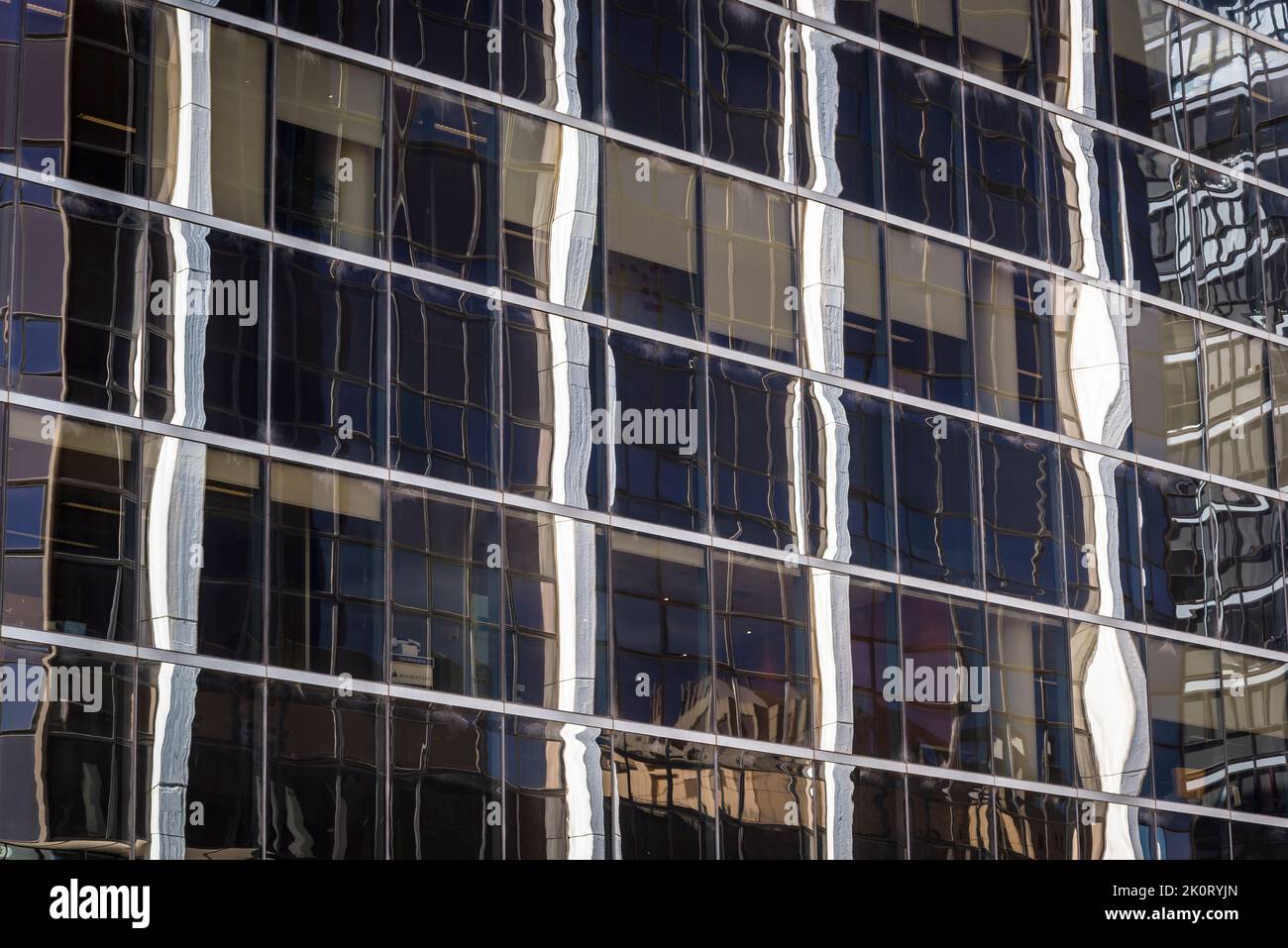 Reflections in glass building on Macquarie Street in the western suburb ...