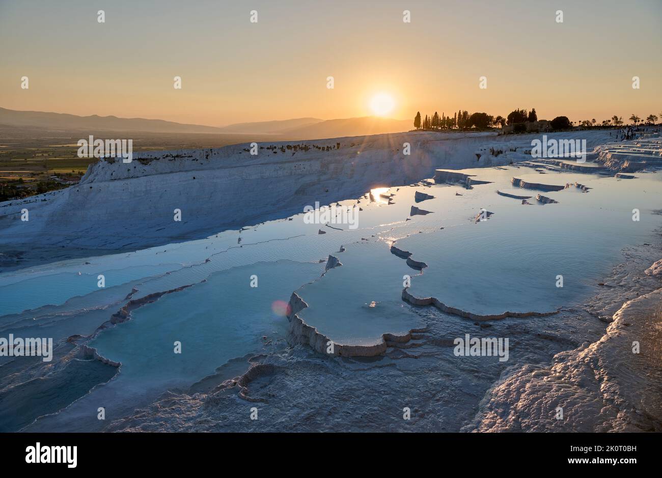 sunset behind Pamukkale travertine terraces, Denizli, Turkey Stock ...