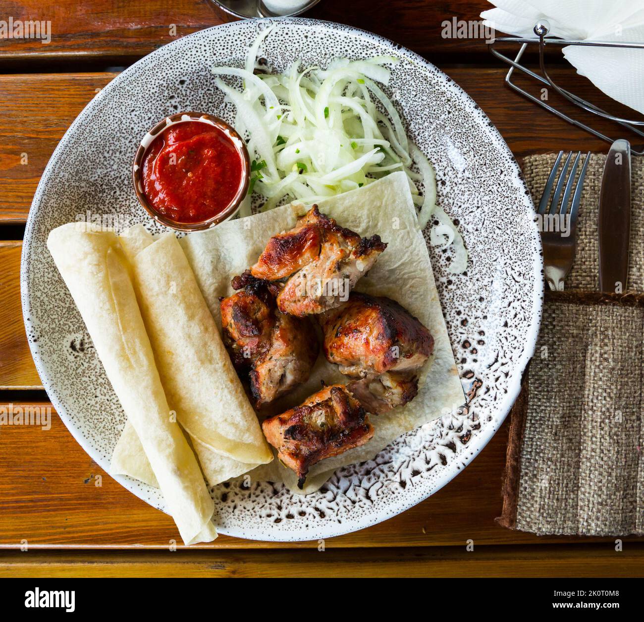 Oriental grilled pork meat shashlik Stock Photo - Alamy