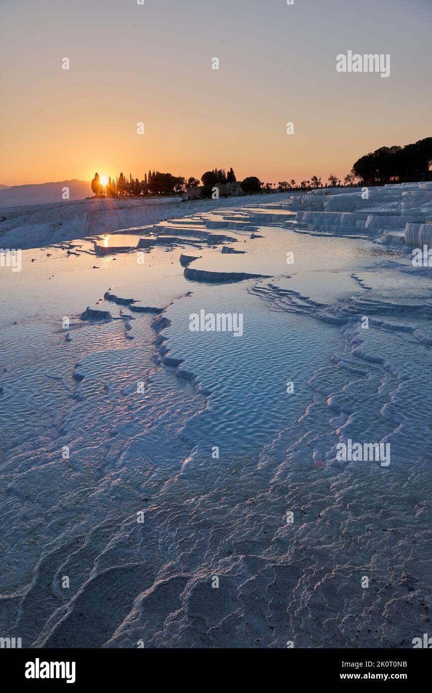 sunset behind Pamukkale travertine terraces, Denizli, Turkey Stock ...