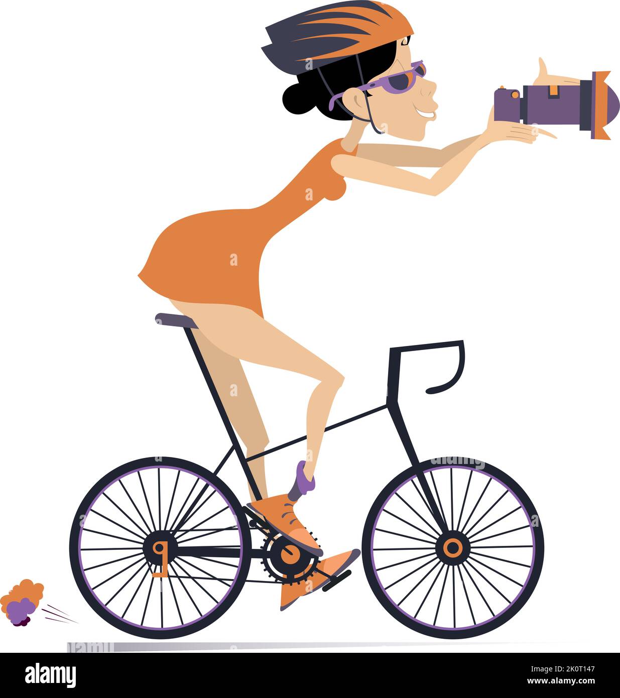 Woman with a camera riding a bike. Cycling woman with a camera making a ...