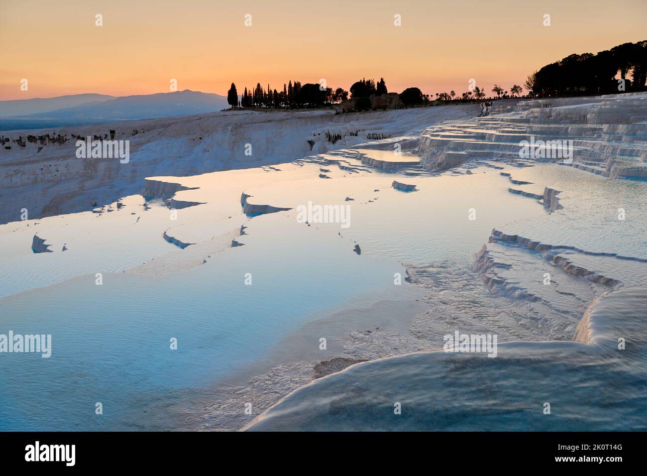 sunset behind Pamukkale travertine terraces, Denizli, Turkey Stock ...