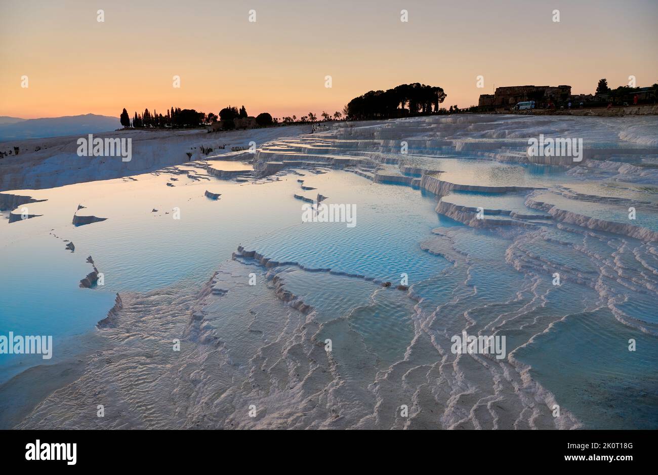 sunset behind Pamukkale travertine terraces, Denizli, Turkey Stock ...
