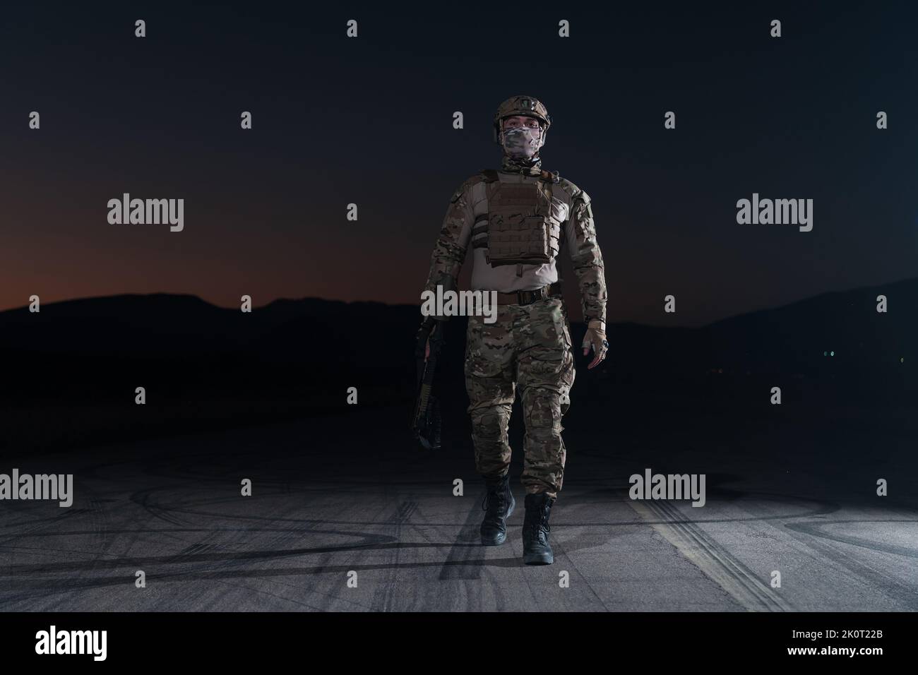 Army soldier in Combat Uniforms with an assault rifle, plate carrier ...