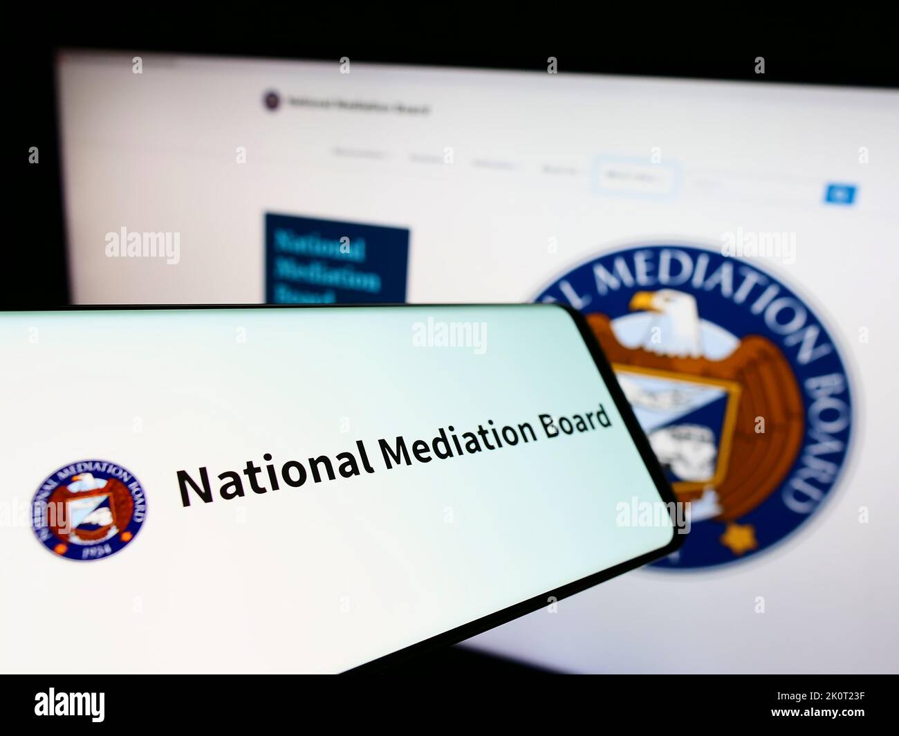 Mobile phone with logo of American agency National Mediation Board (NMB ...