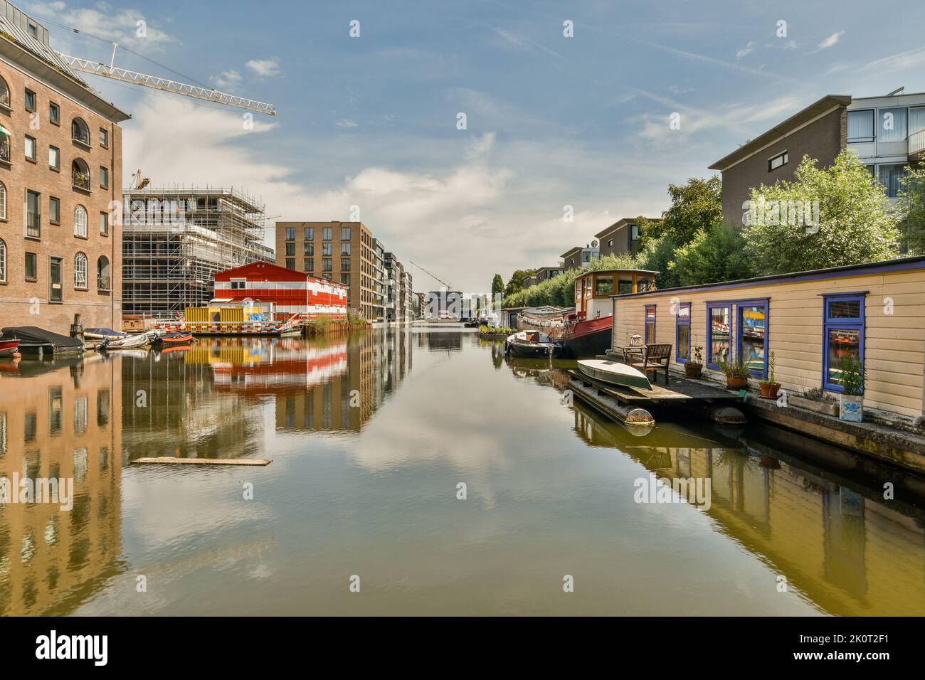 View of river near building with beauty of vegetation outside Stock ...