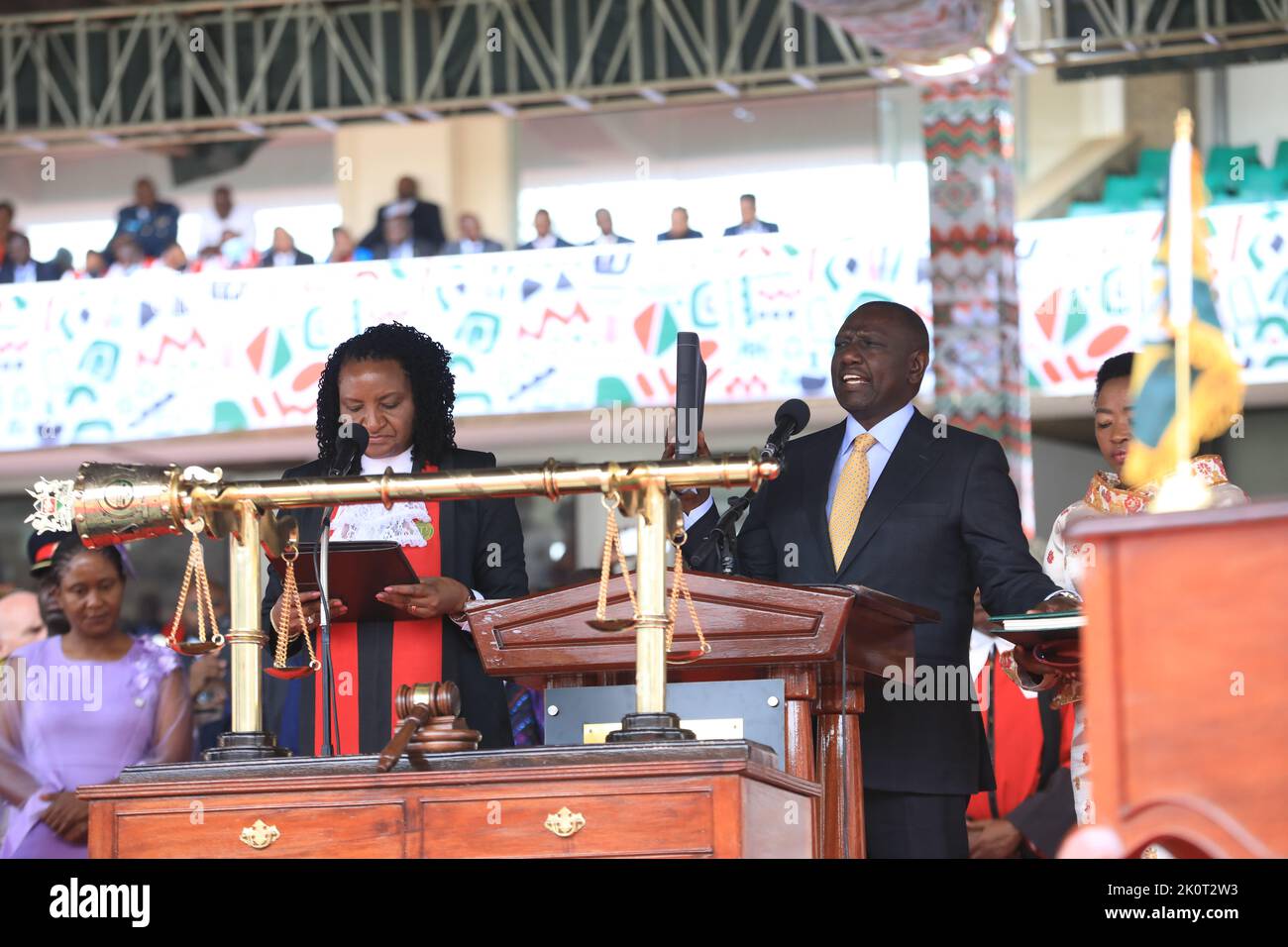 Nairobi, Kenya. 13th Sep, 2022. President William Ruto (R) takes the oath of office during the ...