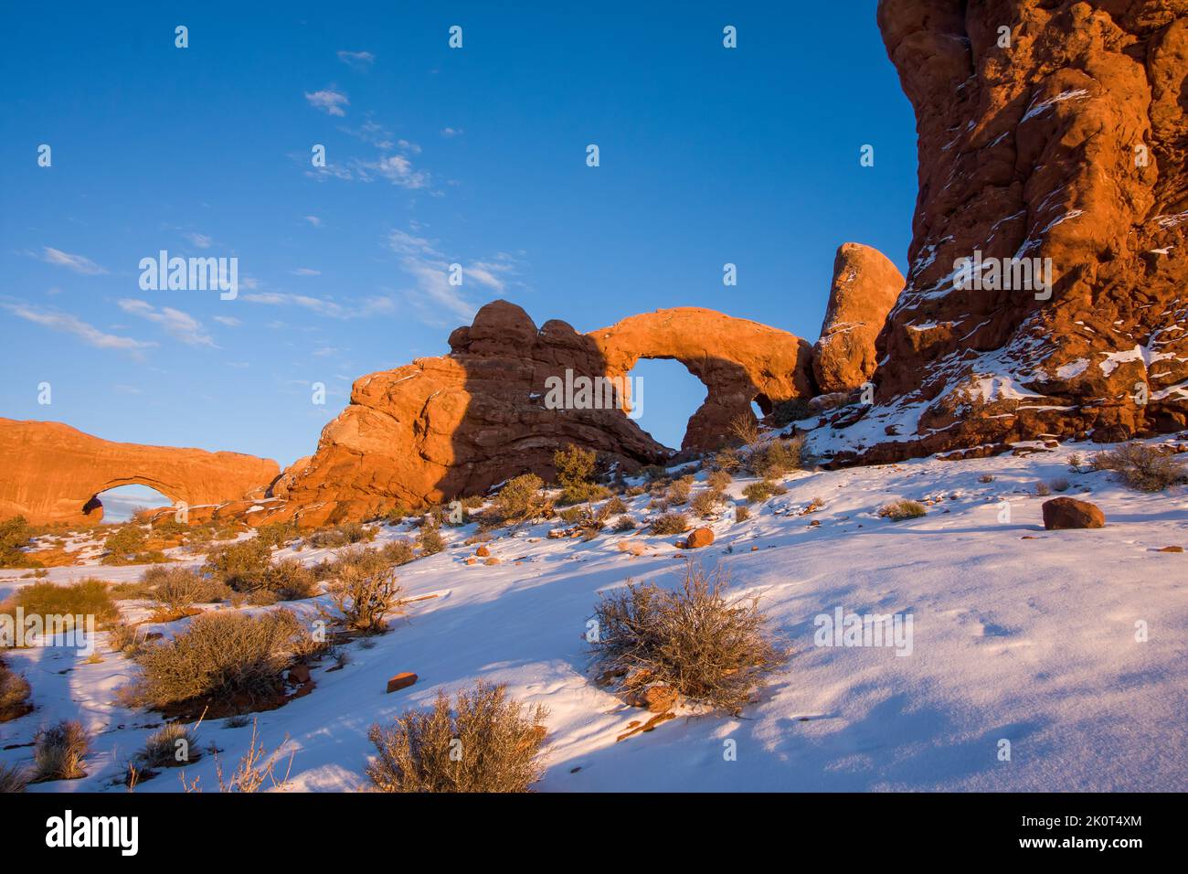 Turret Arch and the North Window with snow in winter in the WIndows ...