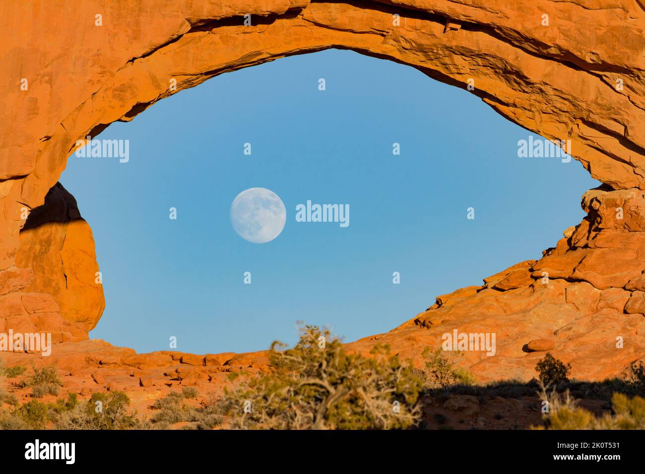 Moon rising in the North Window, an Entrada sandstone arch in the ...