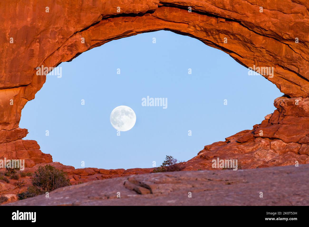 Moon rising in the North Window, an Entrada sandstone arch in the ...