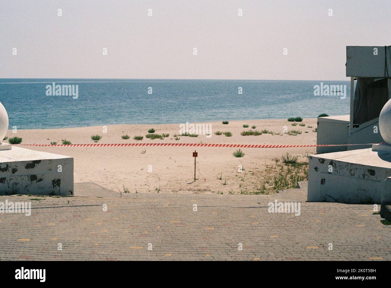 A beach with a barricade tape Stock Photo - Alamy