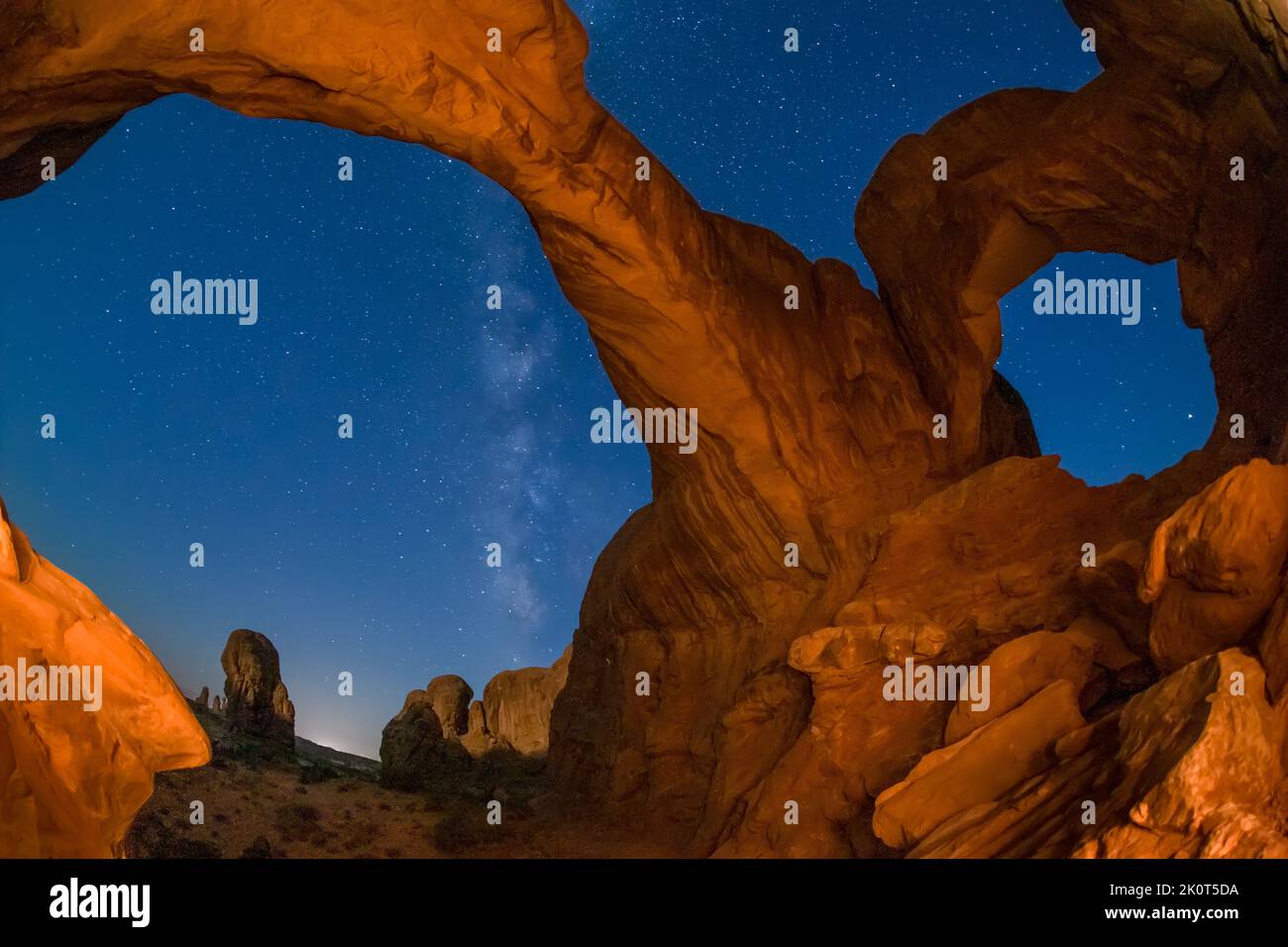 Double Arch at night with the MIlky Way & artificial light painting ...