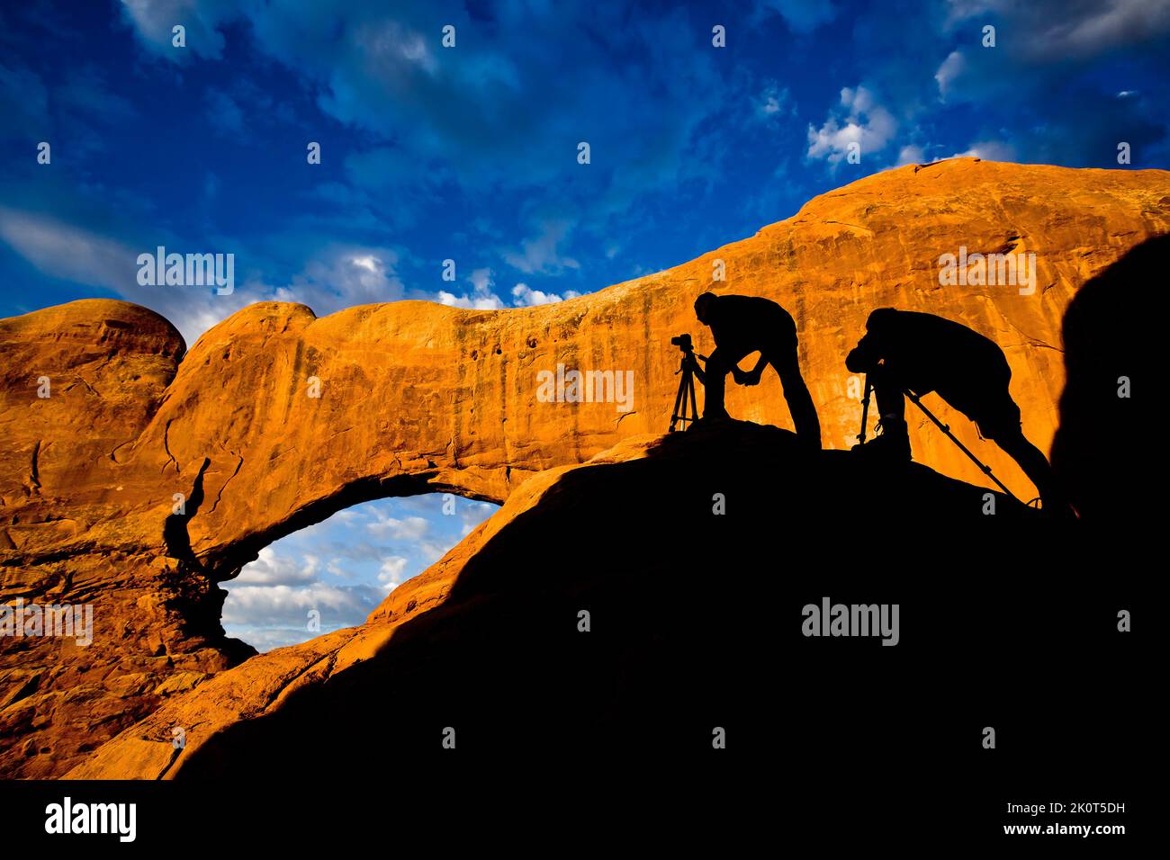 Silhouette of photographers taking a picture of the North Window at ...