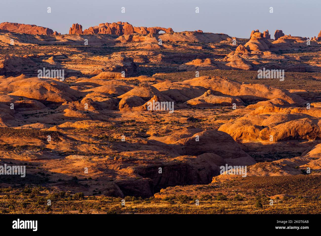 Sunset light on the Navajo sandstone Petrified Dunes with the South ...