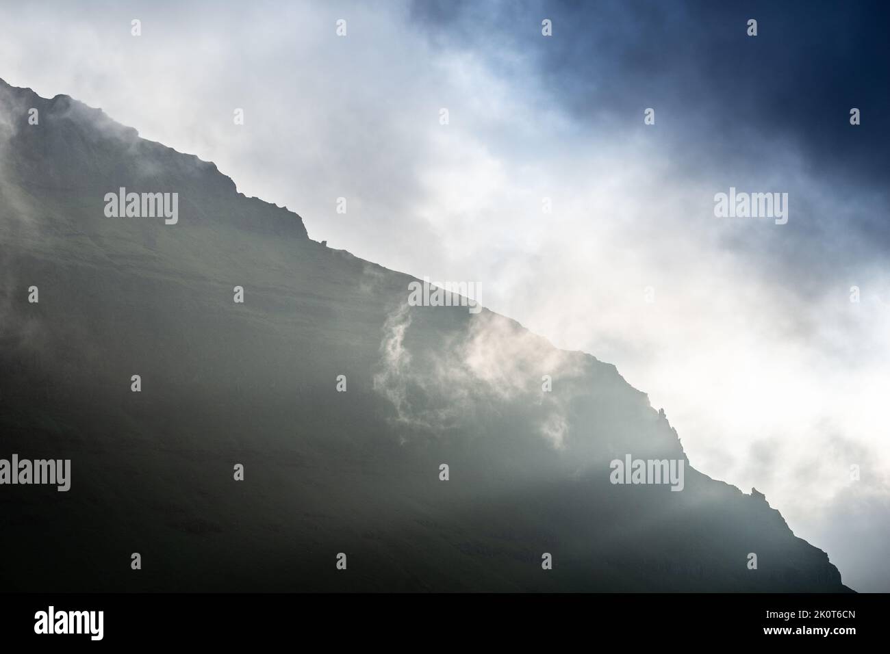 Fog and mist over mountain rige, Iceland - HDR photograph Stock Photo ...