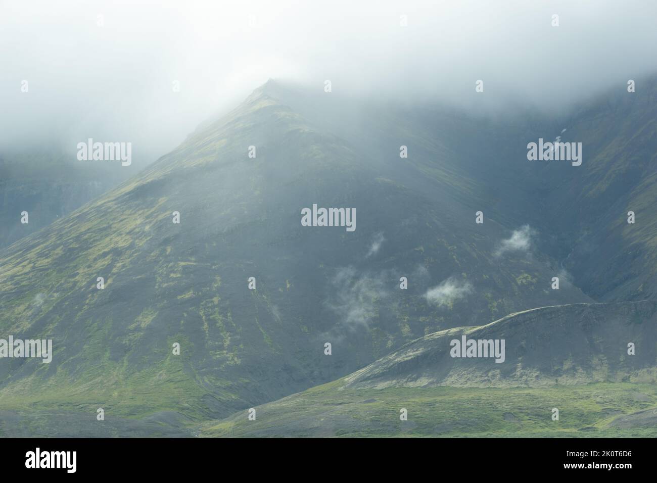 Fog and mist over mountains in Iceland - HDR photograph Stock Photo - Alamy