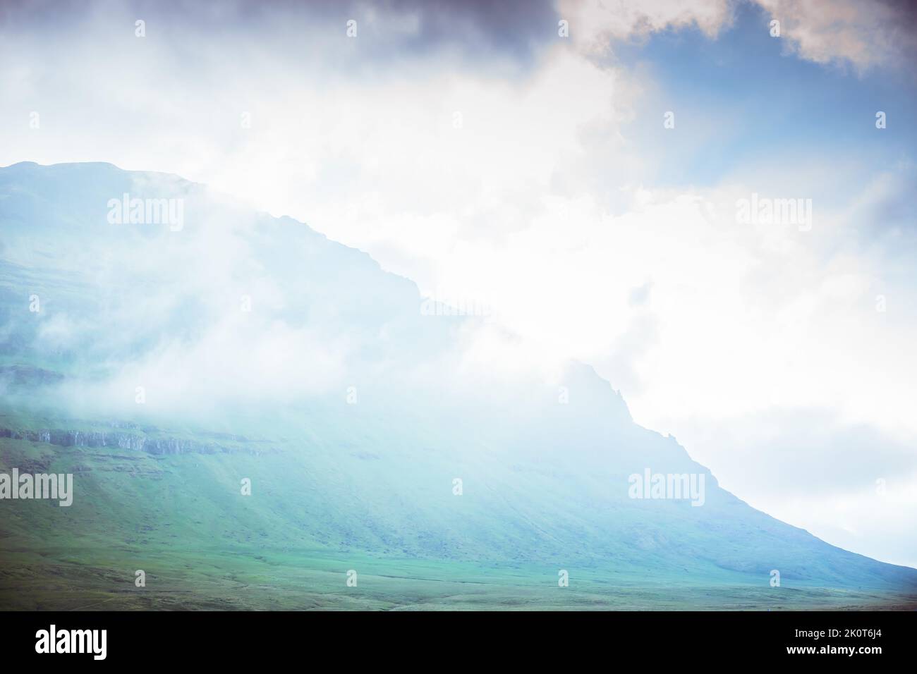 Fog and mist over mountain rige, Iceland - HDR photograph Stock Photo ...