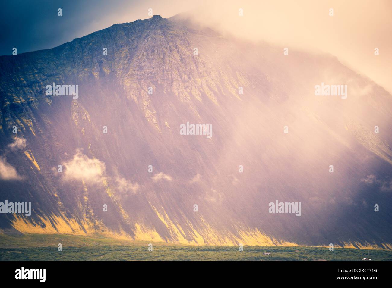 Fog and mist over mountains in Iceland - HDR photograph Stock Photo - Alamy