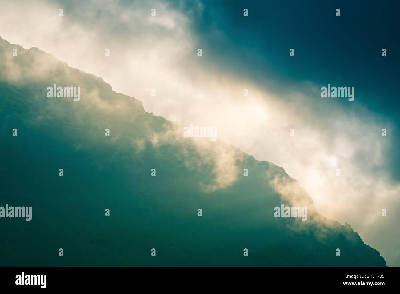 Fog and mist over mountain rige, Iceland - HDR photograph Stock Photo ...