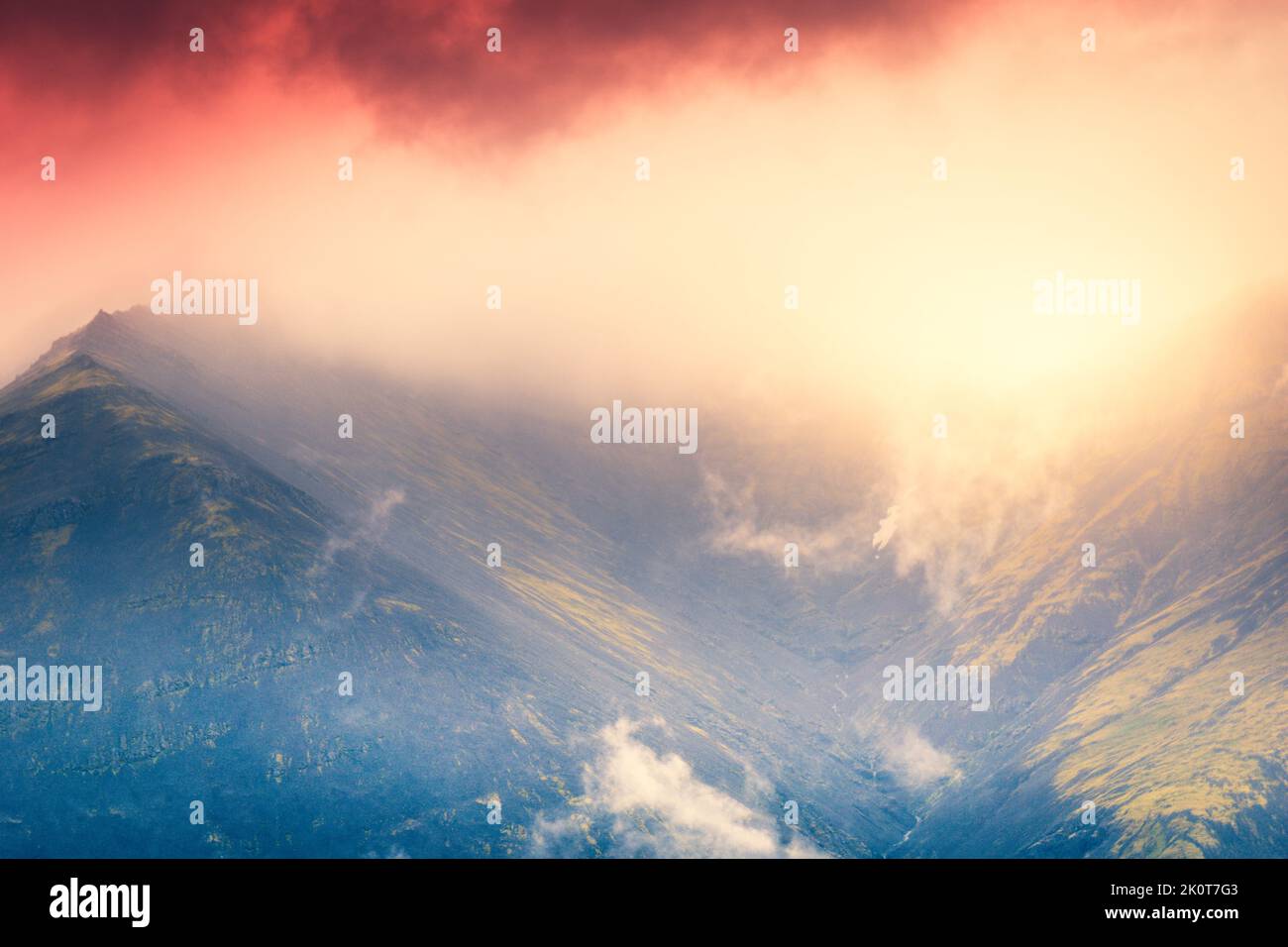 Fog and mist over mountains in Iceland - HDR photograph Stock Photo - Alamy