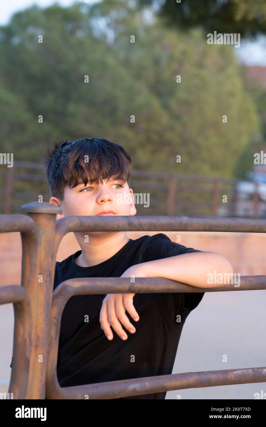 Thoughtful boy looking away hi-res stock photography and images - Alamy