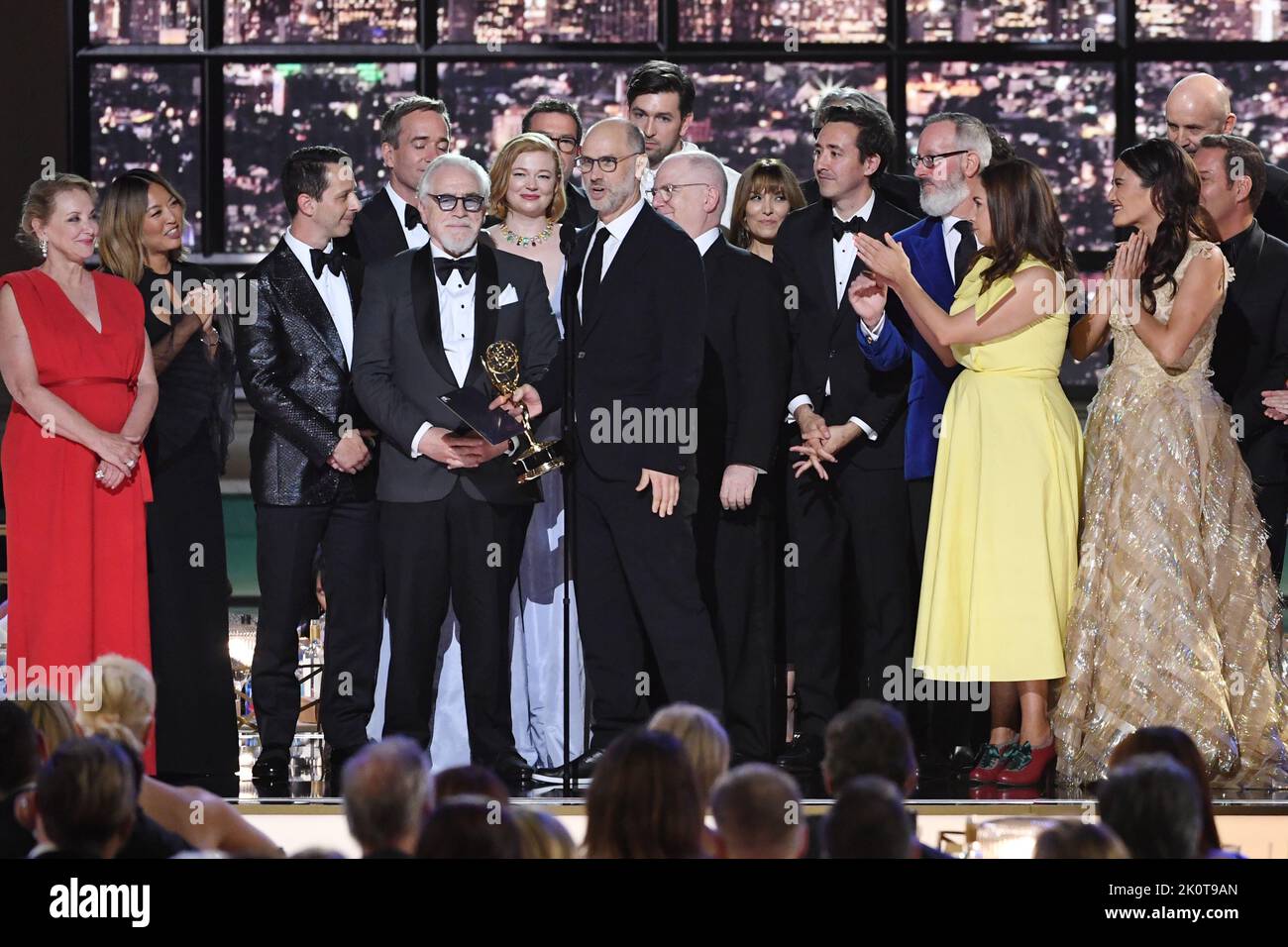 Jesse Armstrong, speaking, and the team from “Succession” accept the ...