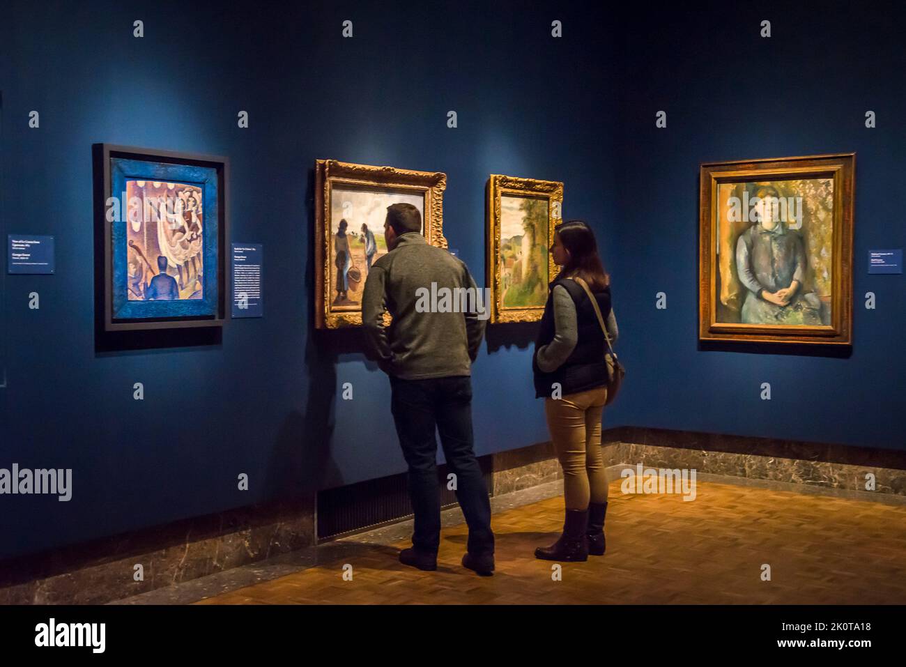 Visitors looking at Impressionist paintings, Detroit Institute of Arts ...