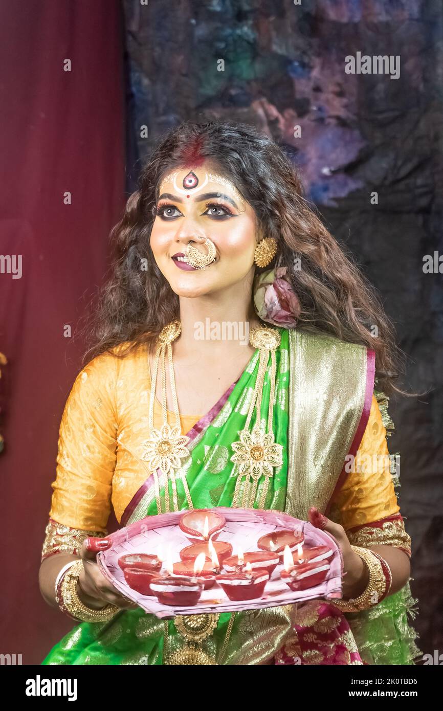 Agomoni concept photo shoot, a poses for the camera Stock Photo - Alamy