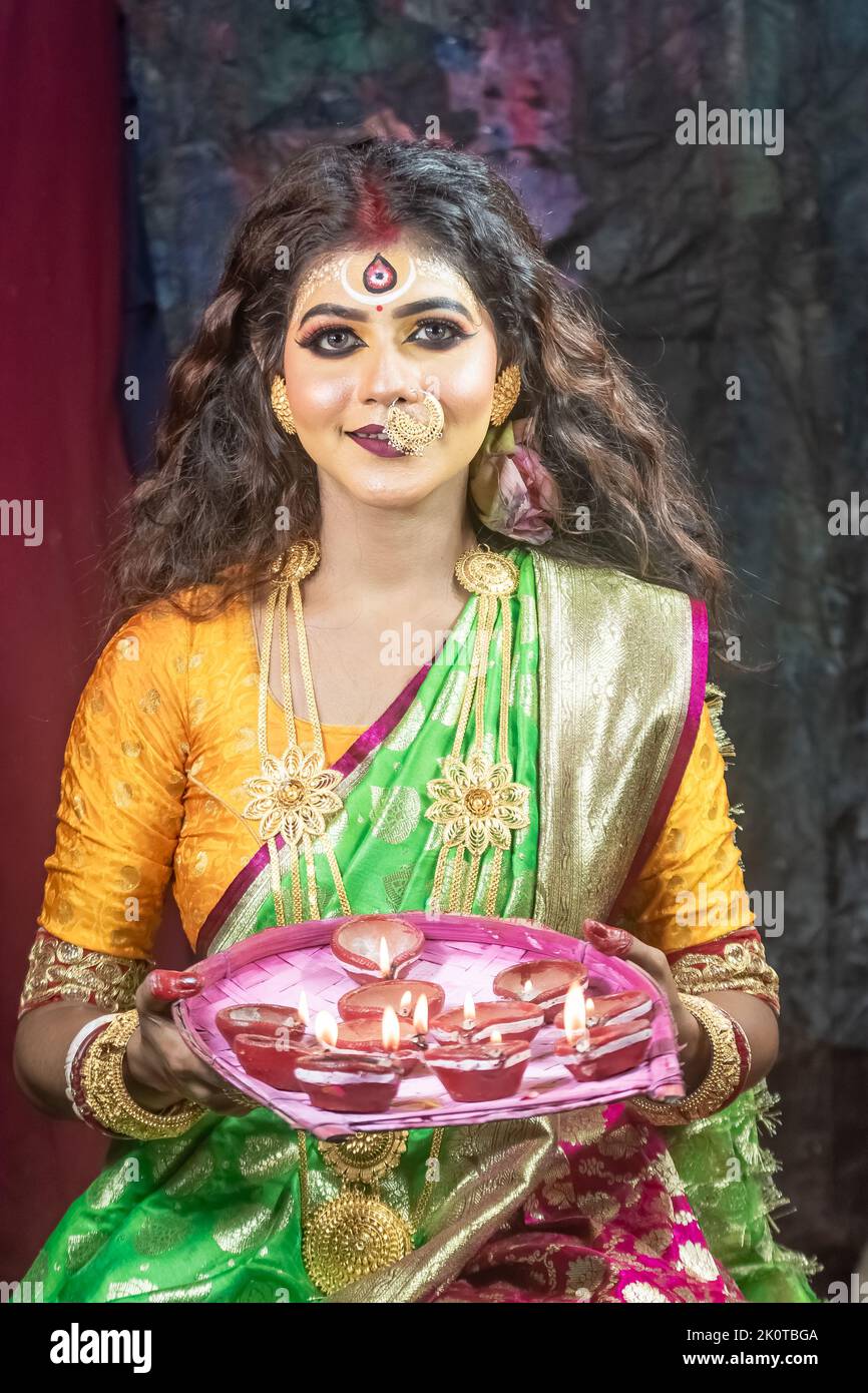 Agomoni concept photo shoot, a poses for the camera Stock Photo - Alamy