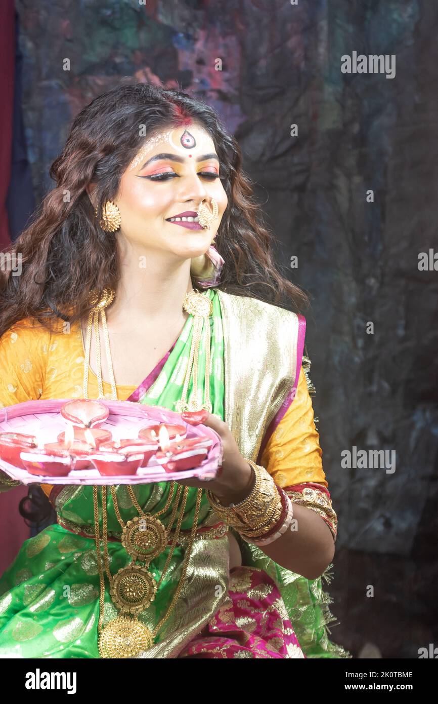 Agomoni concept photo shoot, a poses for the camera Stock Photo - Alamy