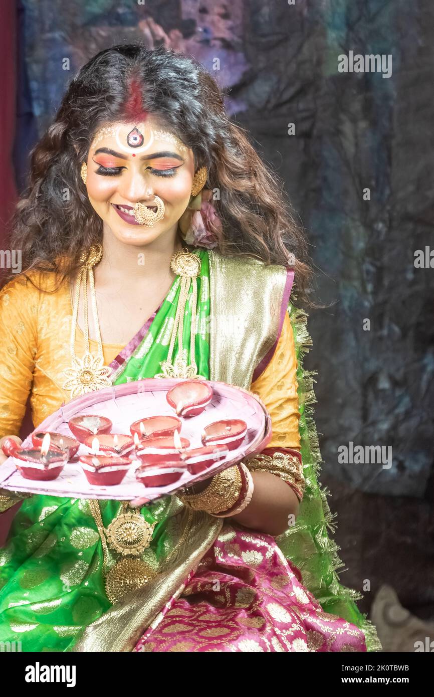 Agomoni concept photo shoot, a poses for the camera Stock Photo - Alamy