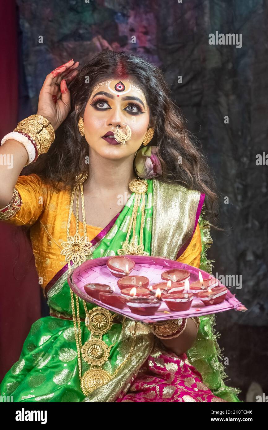 Agomoni concept photo shoot, a poses for the camera Stock Photo - Alamy