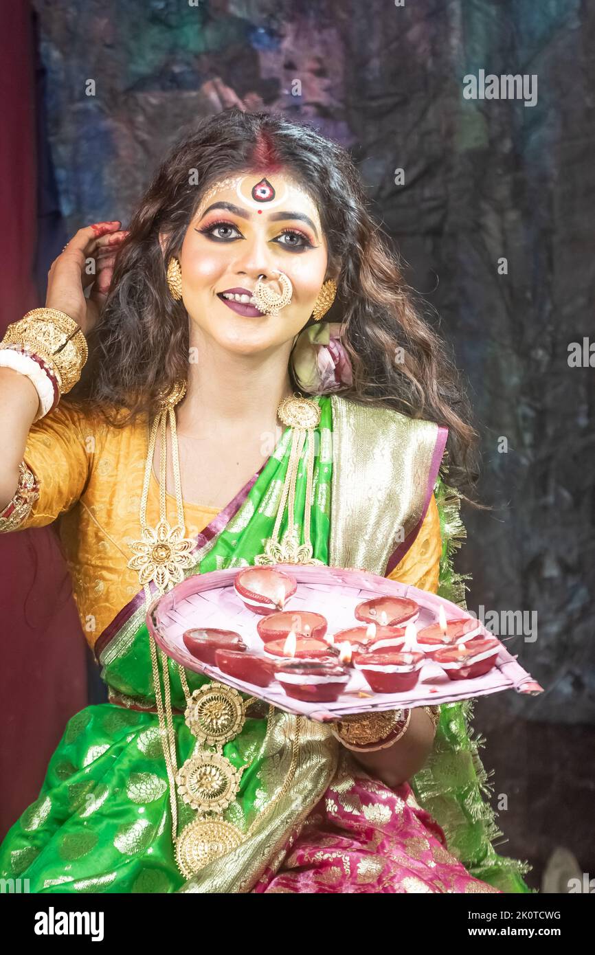 Agomoni concept photo shoot, A poses for the camera Stock Photo - Alamy