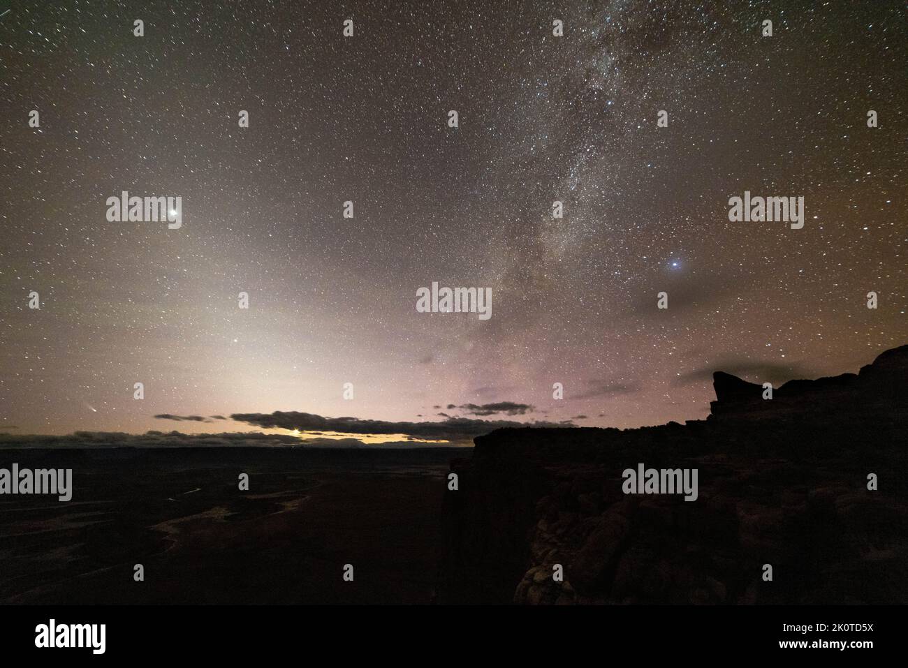 Comet Leonard blending into a starry night sky above the Green River ...