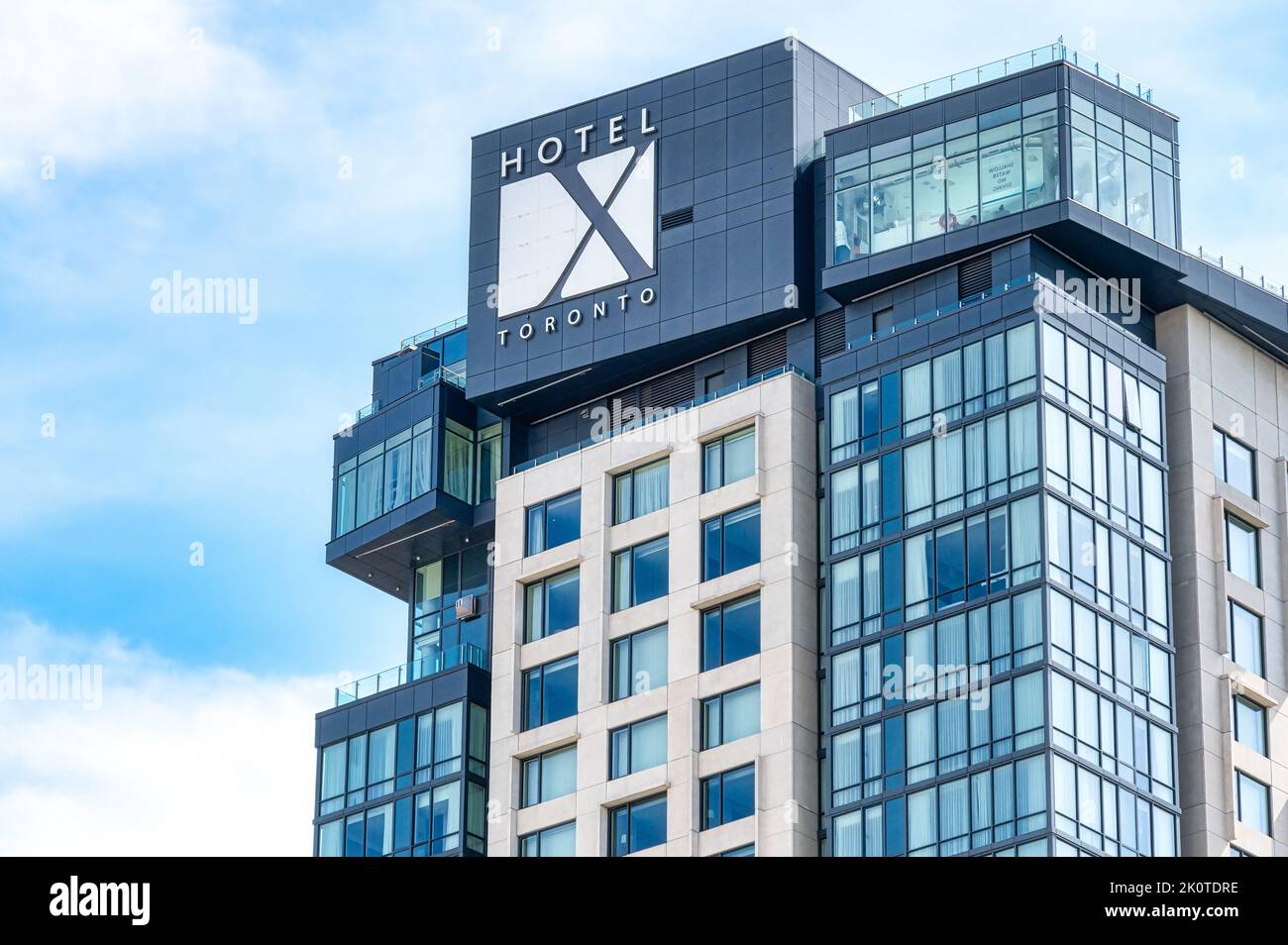Logo or sign on top of Hotel X Toronto by Library Hotel Collection ...