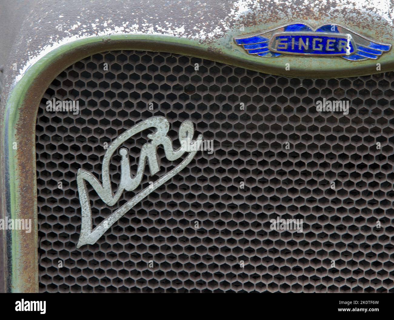 Vintage Singer Nine Car Radiator and Badge Stock Photo - Alamy